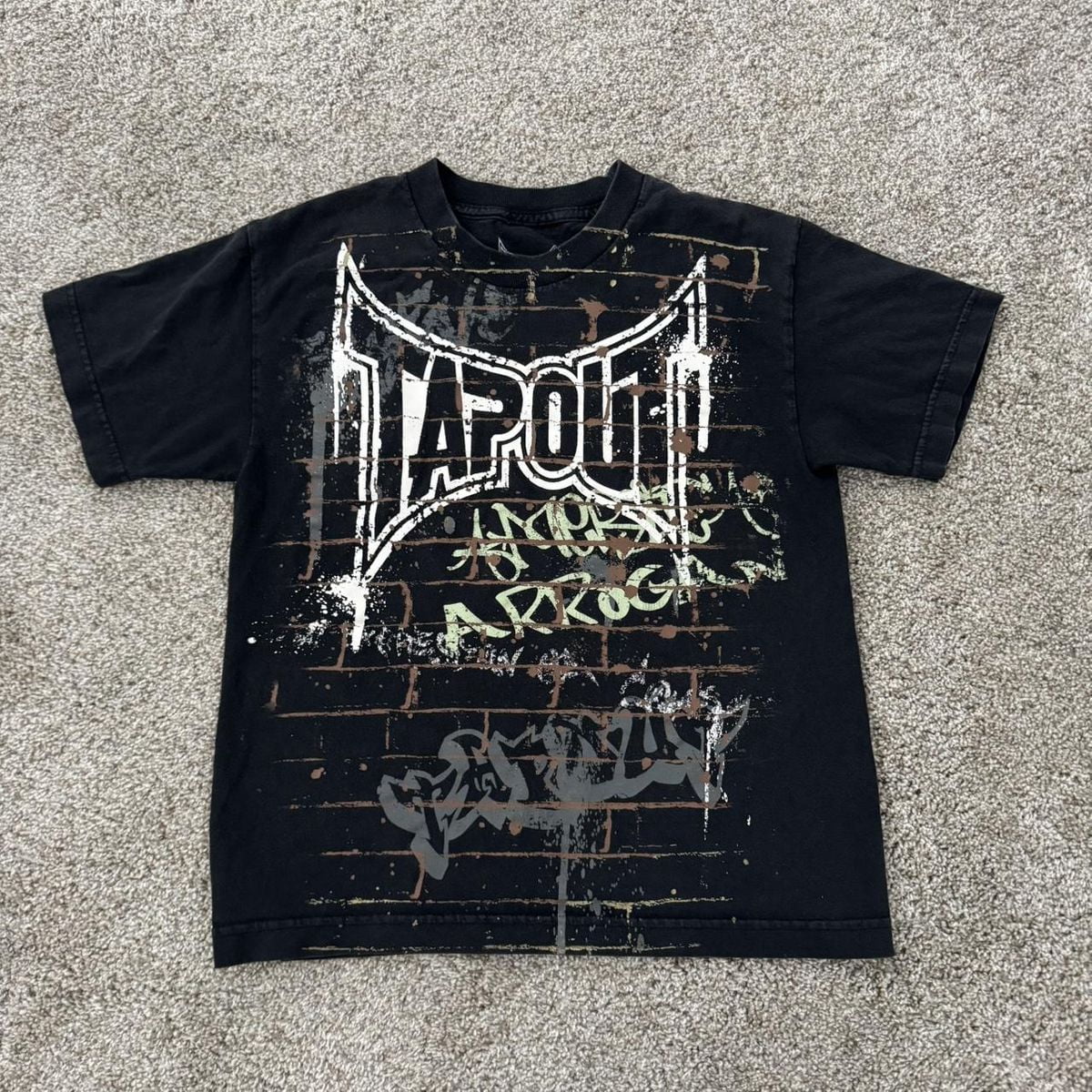 Vintage Tapout Graffiti Tee with Distressed Street Art Logo and Brick ...