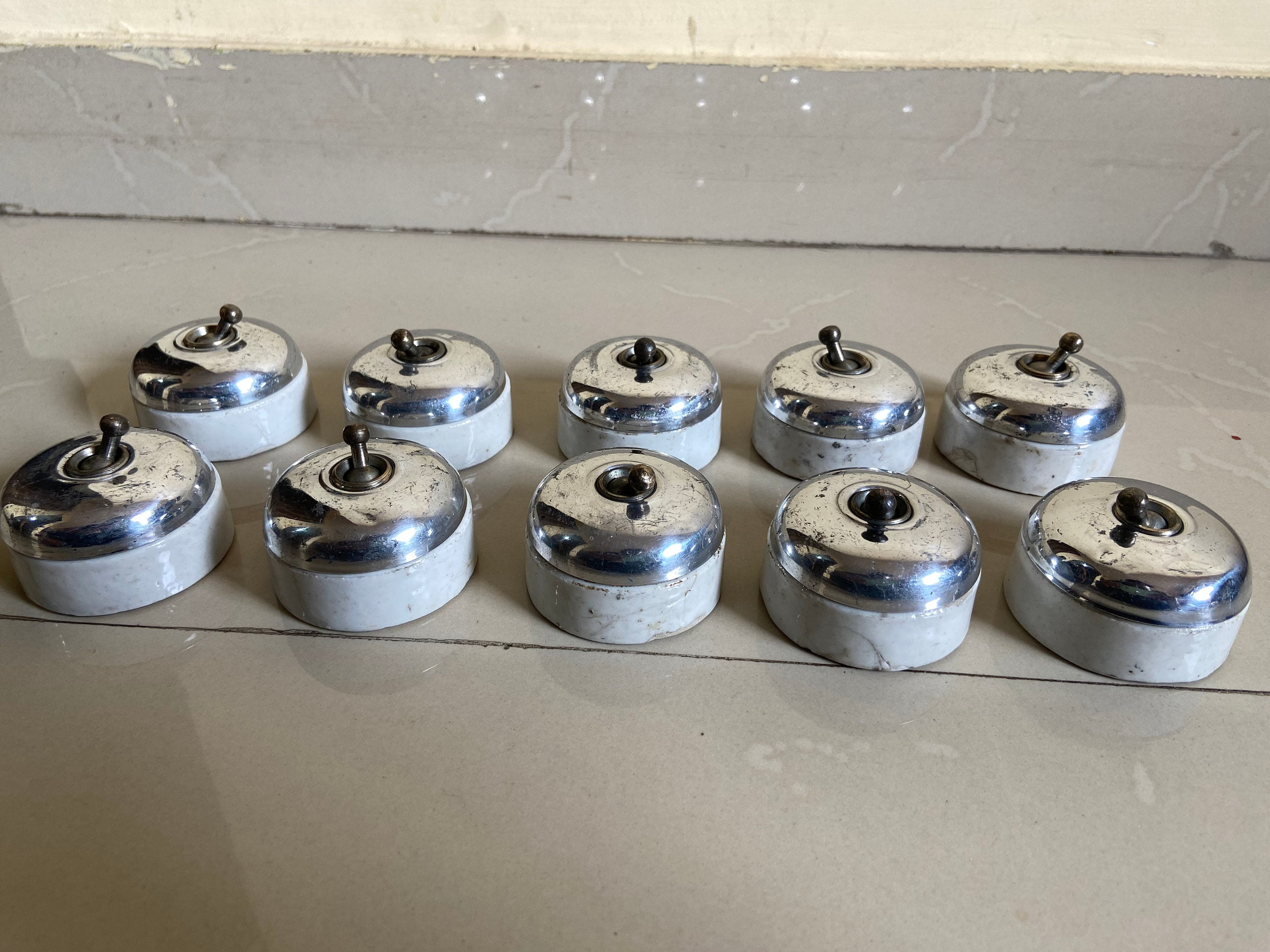 Vintage ceramic light switch chrome silver lid, round toggle switch, on ...