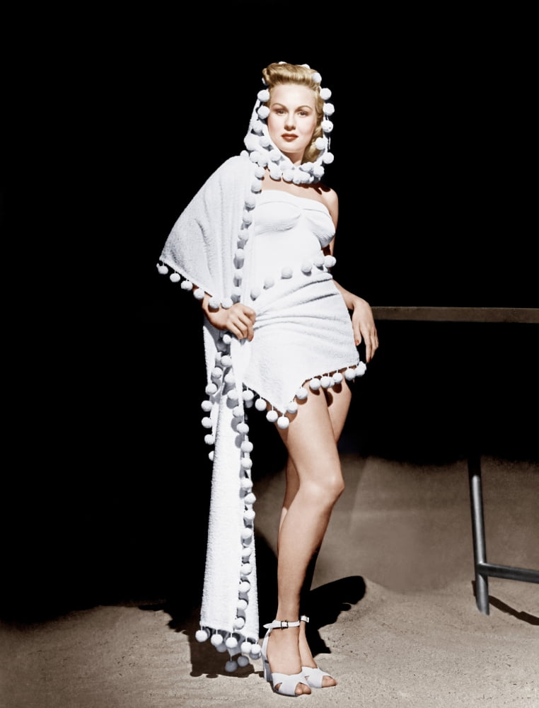 Virginia Mayo Models A Hooded Stole Over Strapless One-Piece Bathing ...