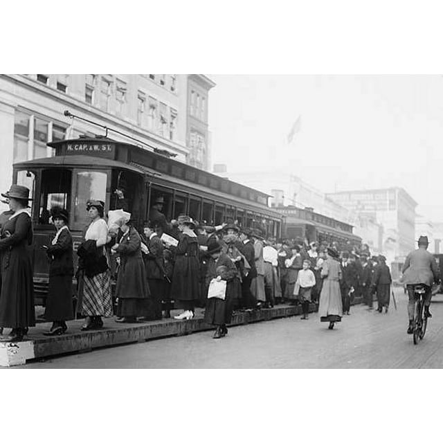 Washington, DC Street scene with Overloaded trolley cars Poster Print ...
