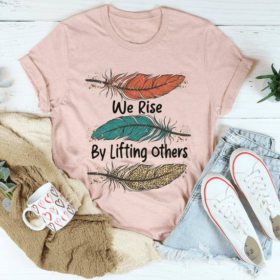 We Rise By Lifting Others Tee Heather Prism Ice Blue S Peachy Sunday T ...