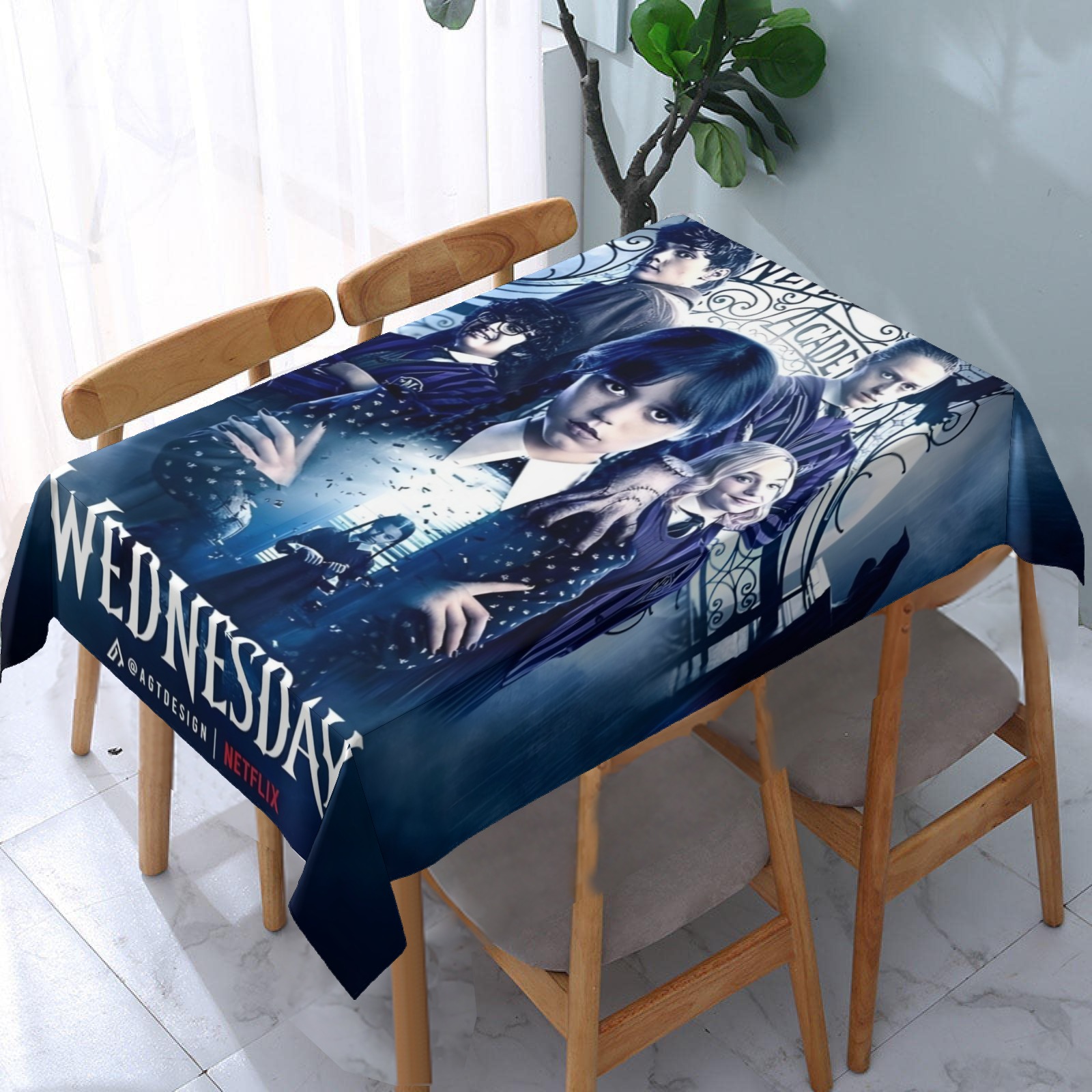 Wednesday square tablecloth has an iconic print, fits most tables, and ...