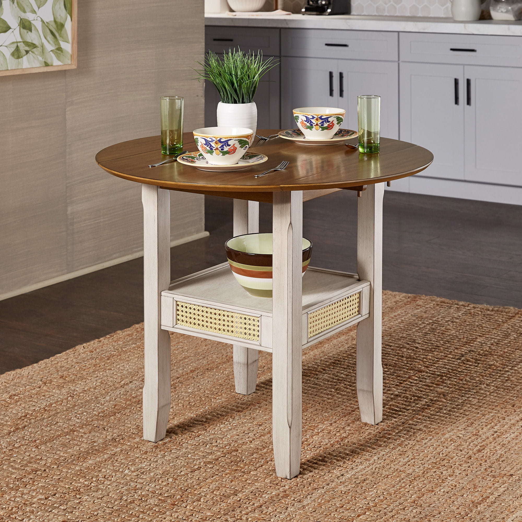 Weston Home Pulukan Cane Accent Round Dining Table with 2 Drop Leaves Oak and Antique Black Finish