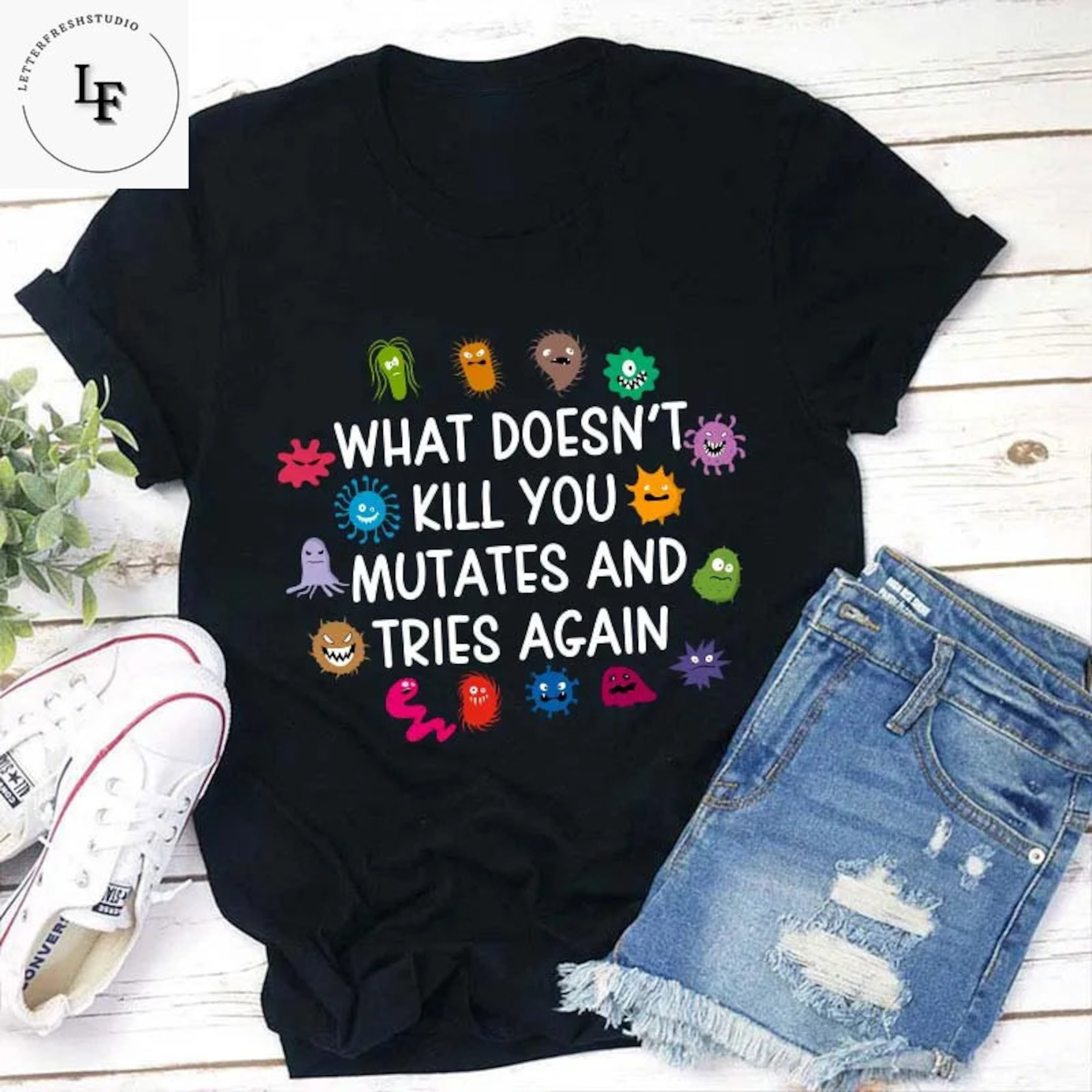 What Doesn't Kill You Mutates And Tries Again Teacher Vintage T-Shirt ...