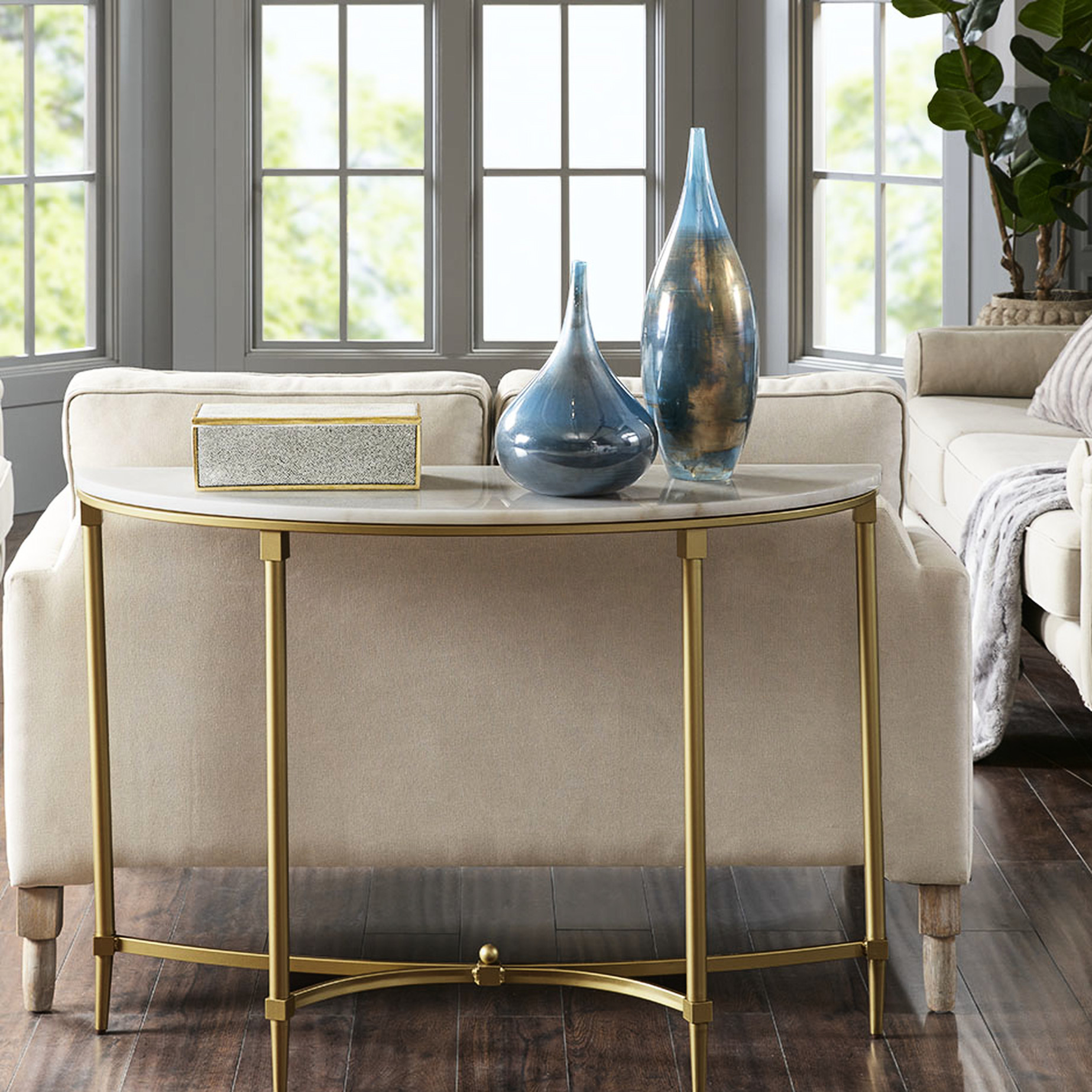 White marble surface and gold leg console - Elevate the look of living ...