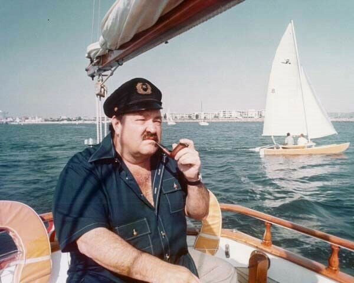 William Conrad as Frank Cannon smoking pipe piloting his yacht 8x10 ...