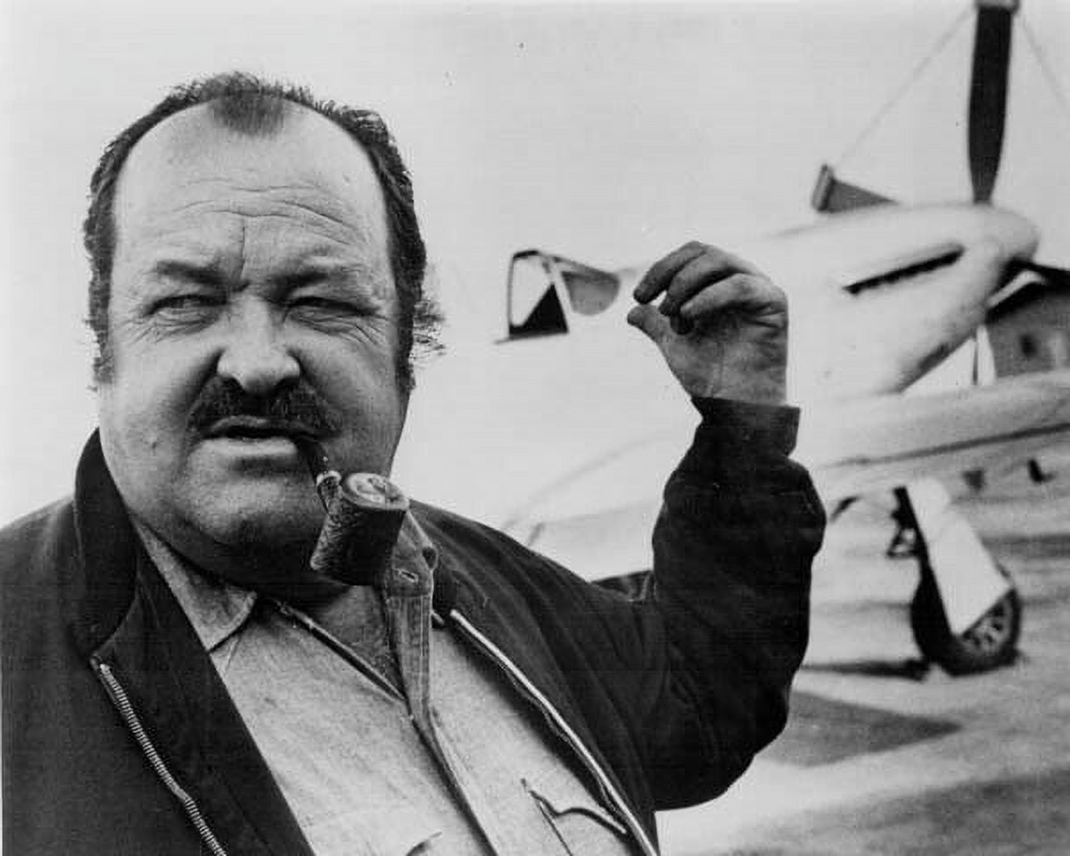 William Conrad smoking his pipe as Frank Cannon at airfield 8x10 inch ...