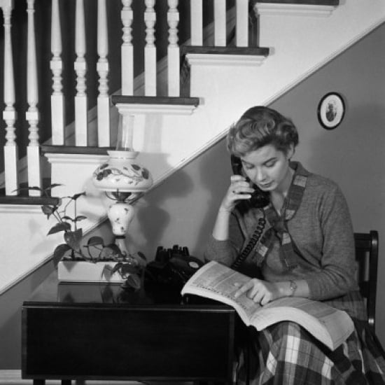 Woman on the phone with telephone directory Poster Print (18 x 24 ...