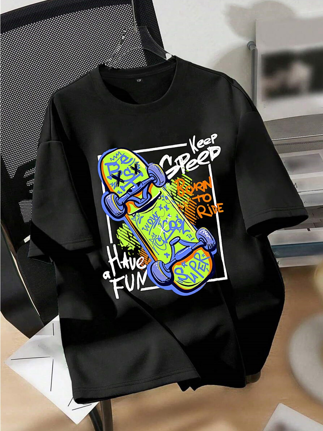 A Youth Casual Short Sleeve T Shirt With A Scooter Design Made From Slightly Stretchy Knitted