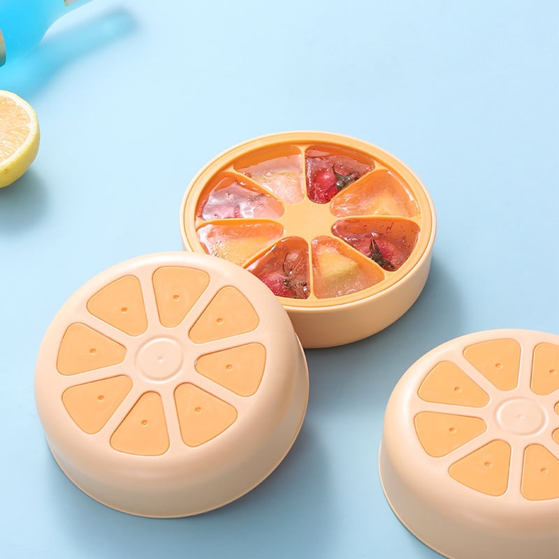 ZXJY A large piece of orange shaped ice cream in the shape of a ...