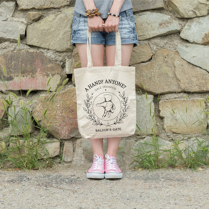 a hand ? anyone? Baldurs Gate 3 tote bag, Gale, Astarion merch, bg3 ...