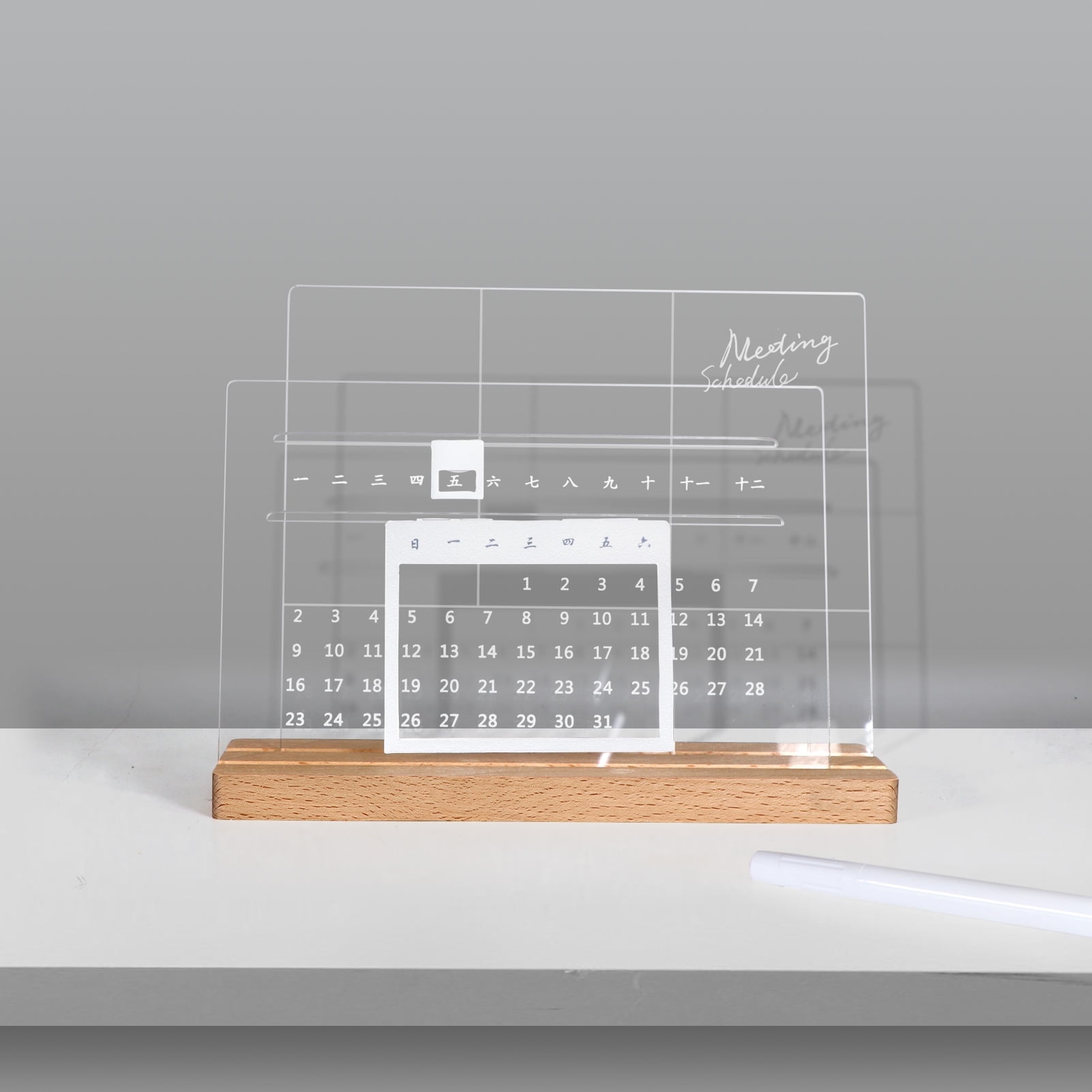This acrylic dry - erase board stand is designed specifically for desks ...
