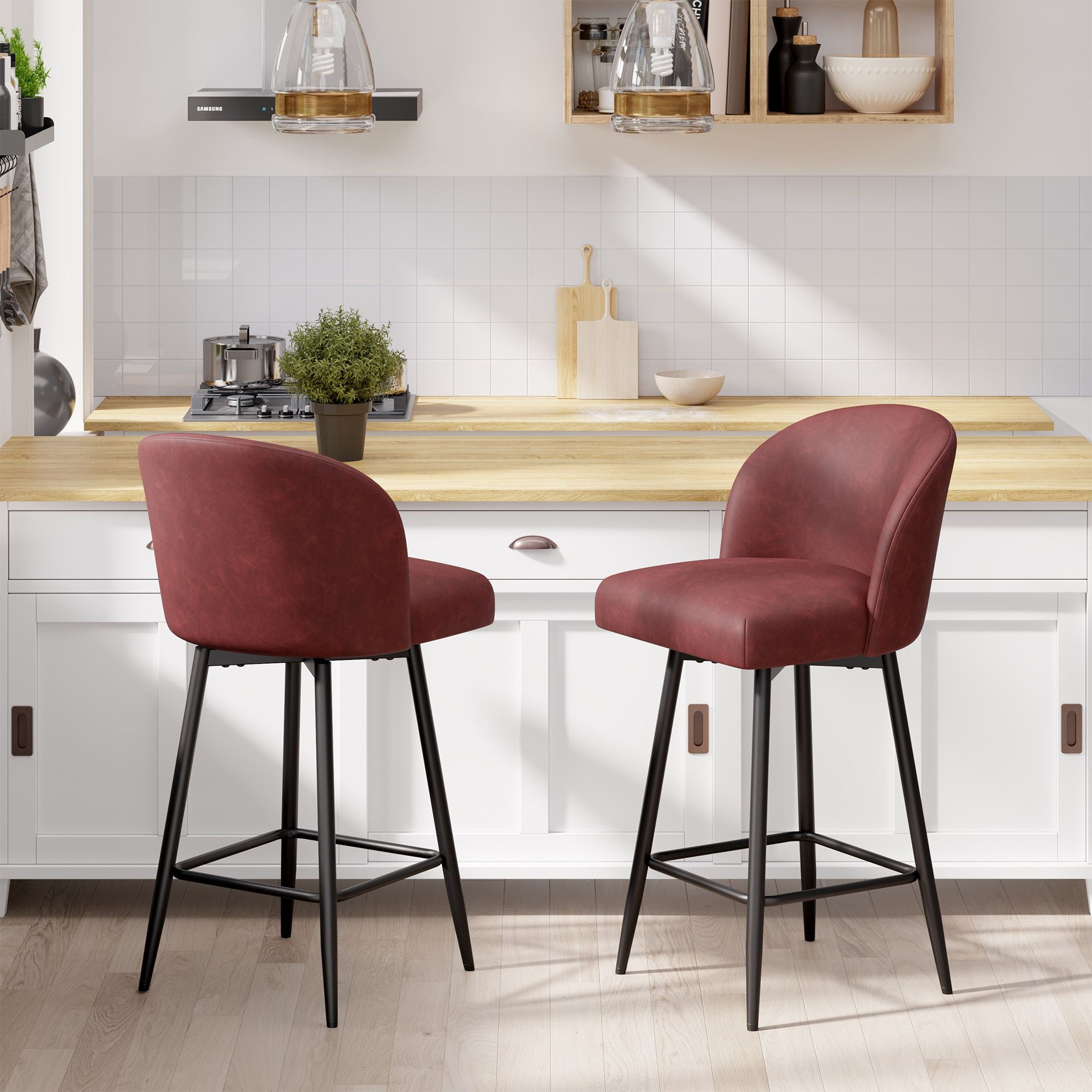 The bar stools feature an arched backrest and seat design, and are ...