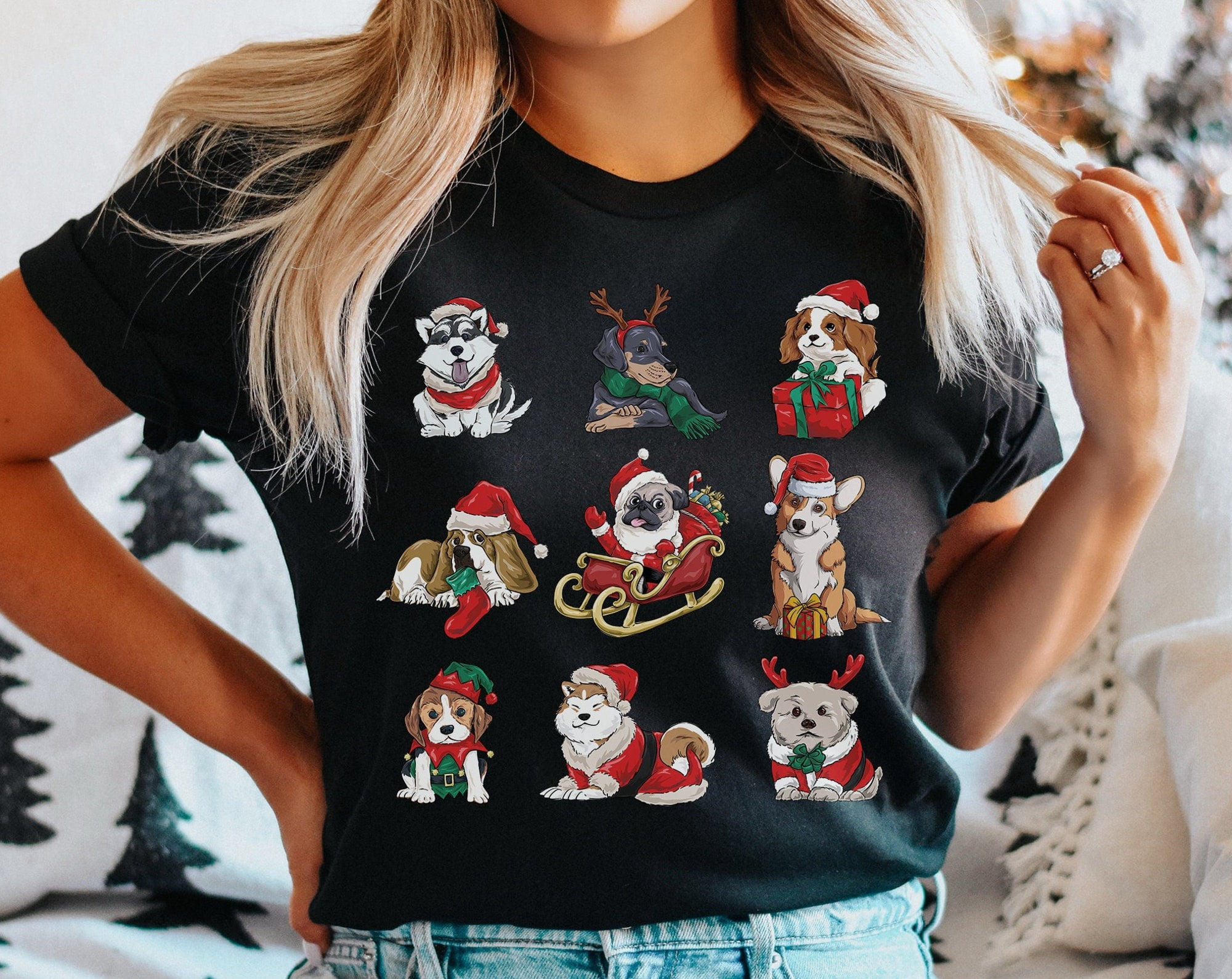 black tshirt with a festive design featuring nine different dogs ...