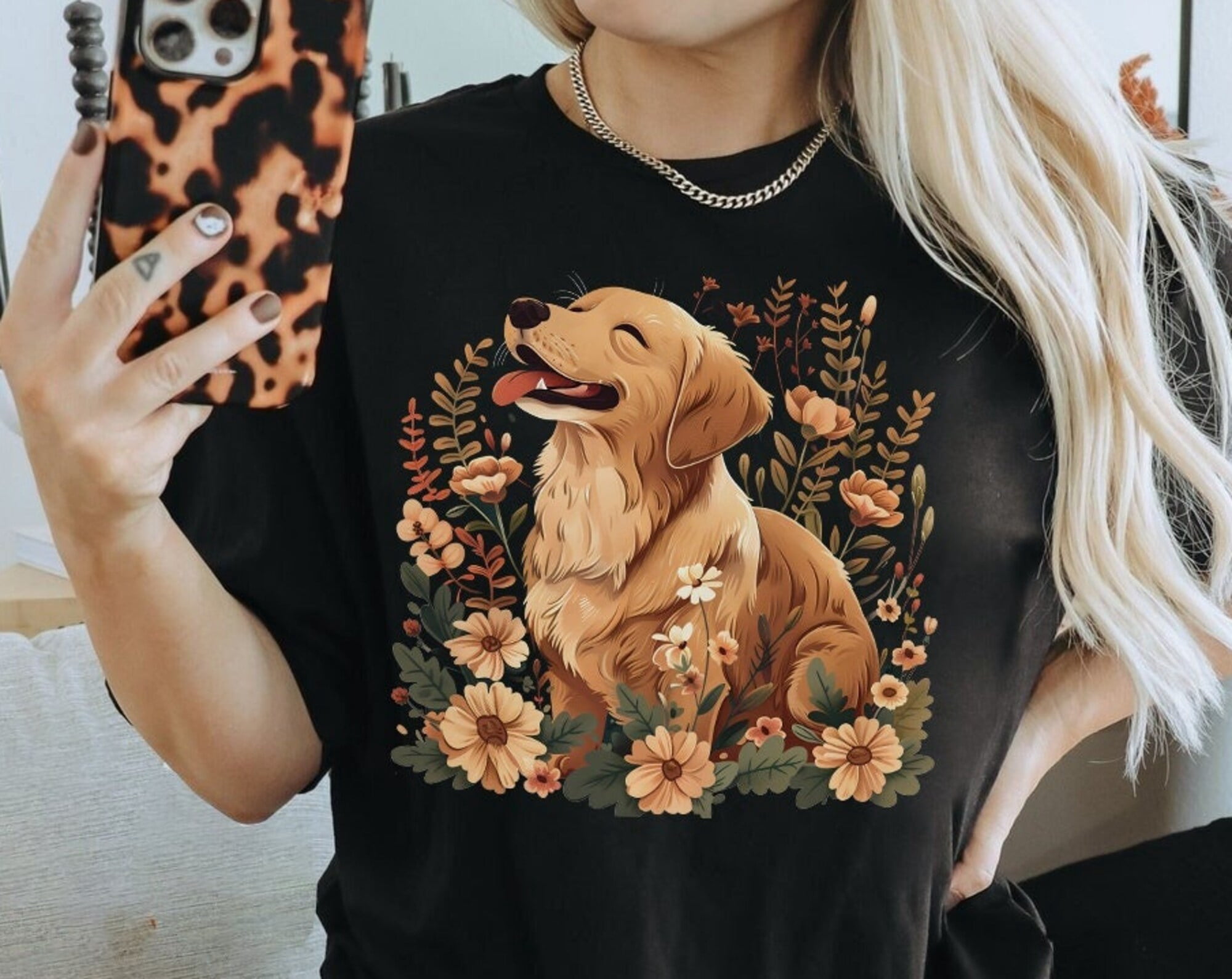 black tshirt with a graphic of a golden retriever dog sitting in a ...
