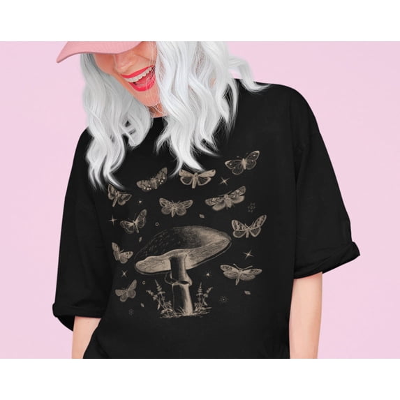 black tshirt with a graphic of a mushroom and butterflies The shirt is ...