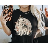 black tshirt with a graphic of a wolf standing in a field of flowers ...