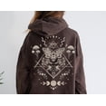 brown hooded TShirt with a graphic print of a moth mushrooms and moon ...