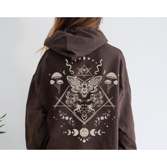 brown hooded TShirt with a graphic print of a moth mushrooms and moon ...