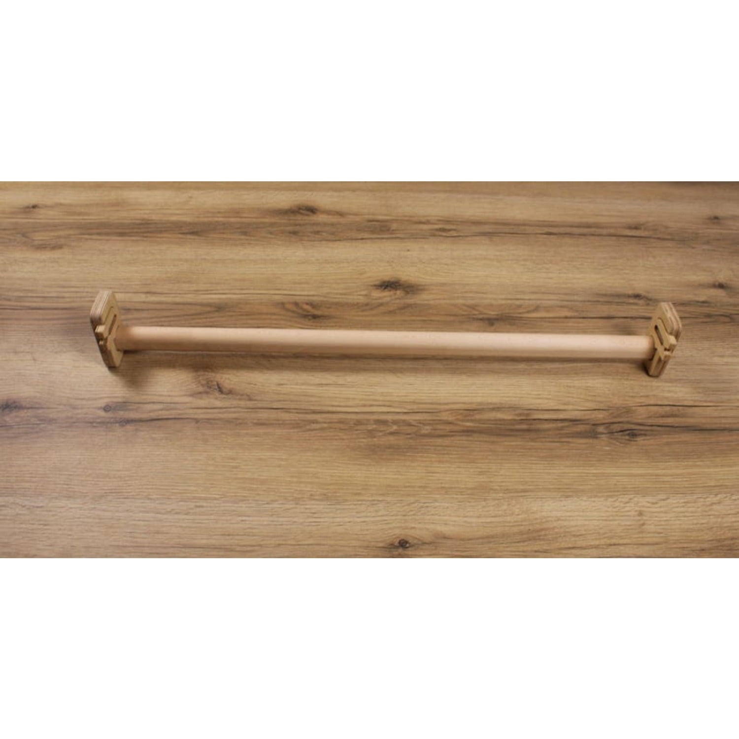 The cut wooden pull-up bar bracket is located outside the door frame ...