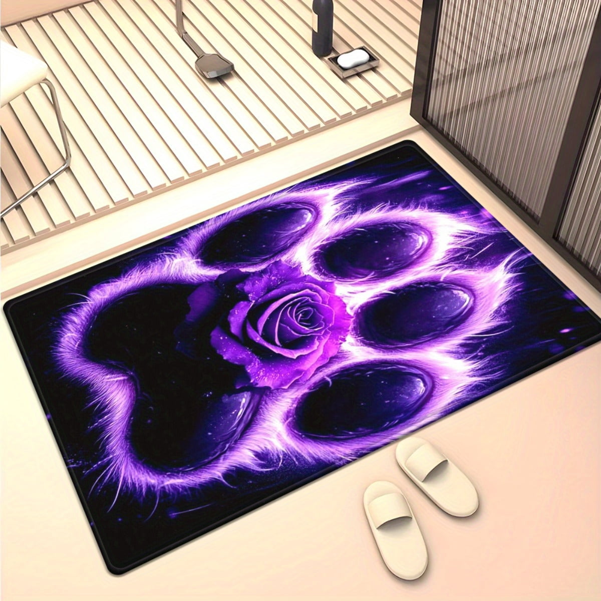 A diatomaceous earth bathroom mat with a purple paw print rose print ...
