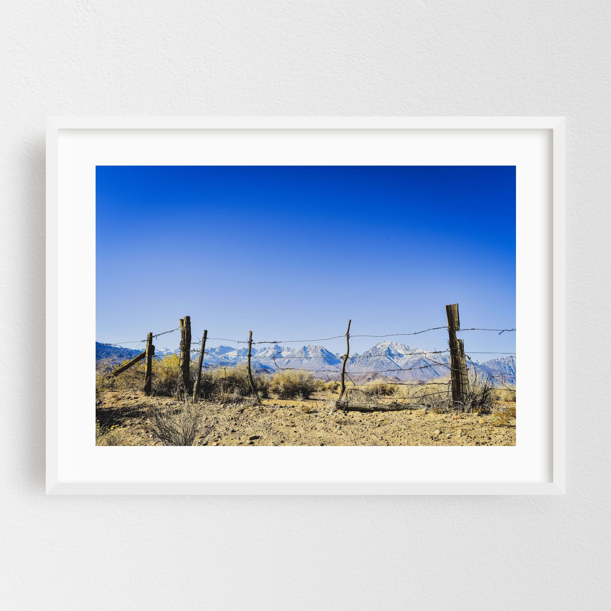 fence in high desert with snowy mountains - Bishop California ...