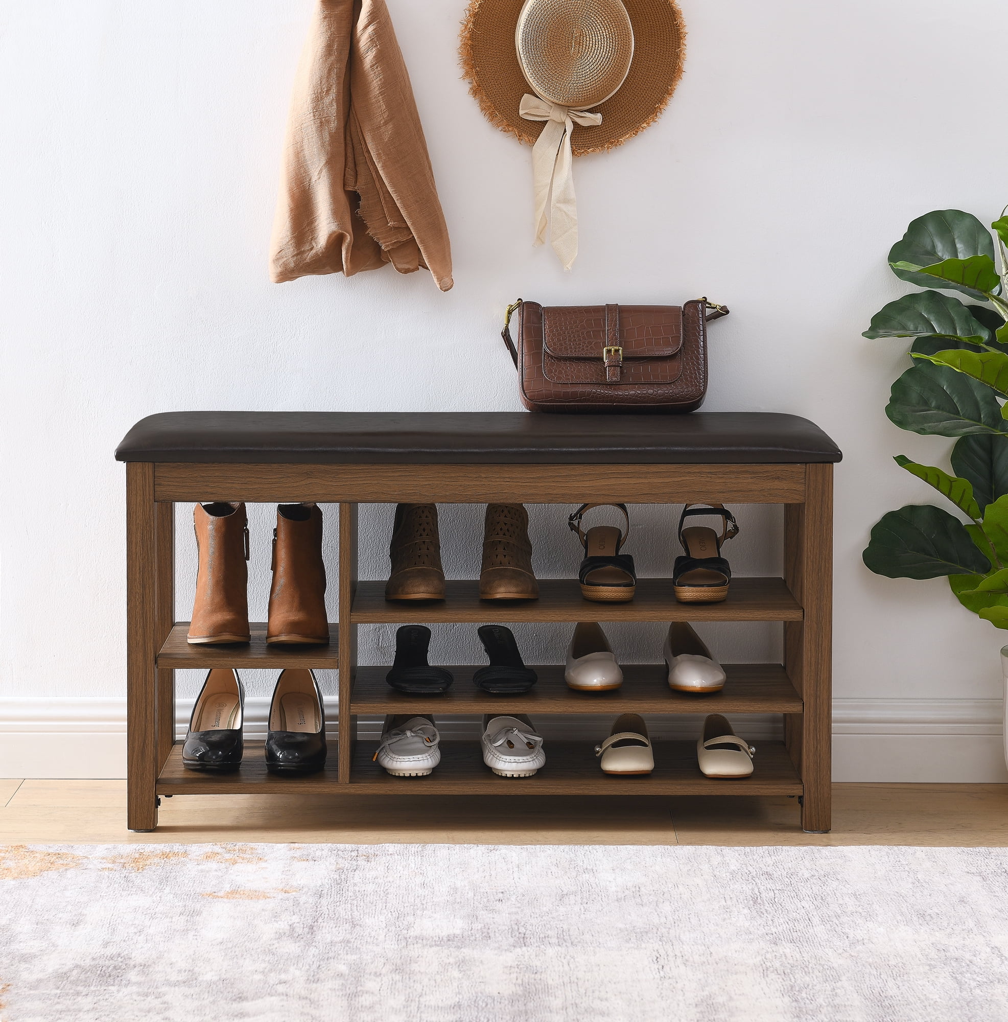 A height-adjustable long shoe-changing bench,made of natural rubberwood ...