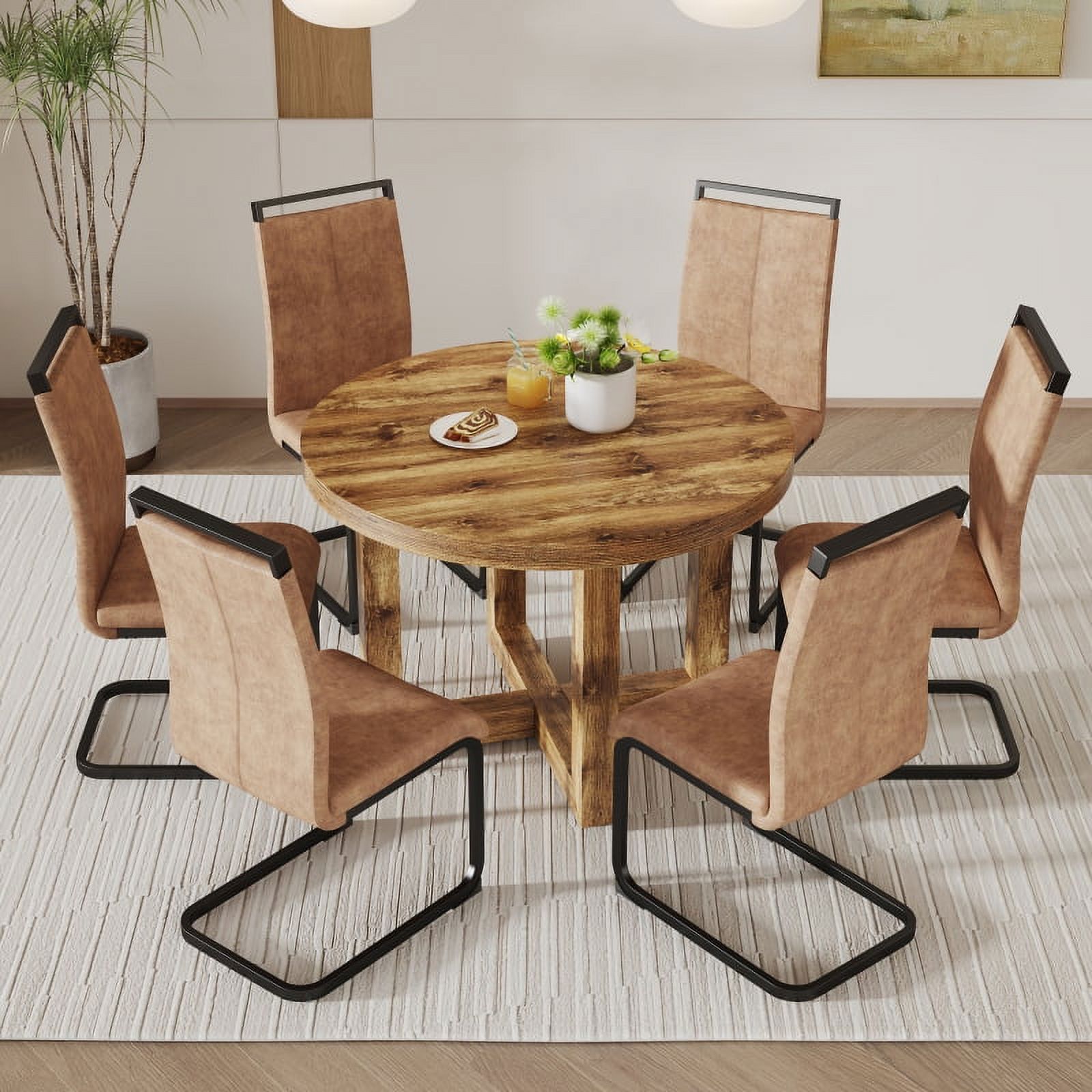 A modern and practical circular dining table. Made of MDF tabletop and ...