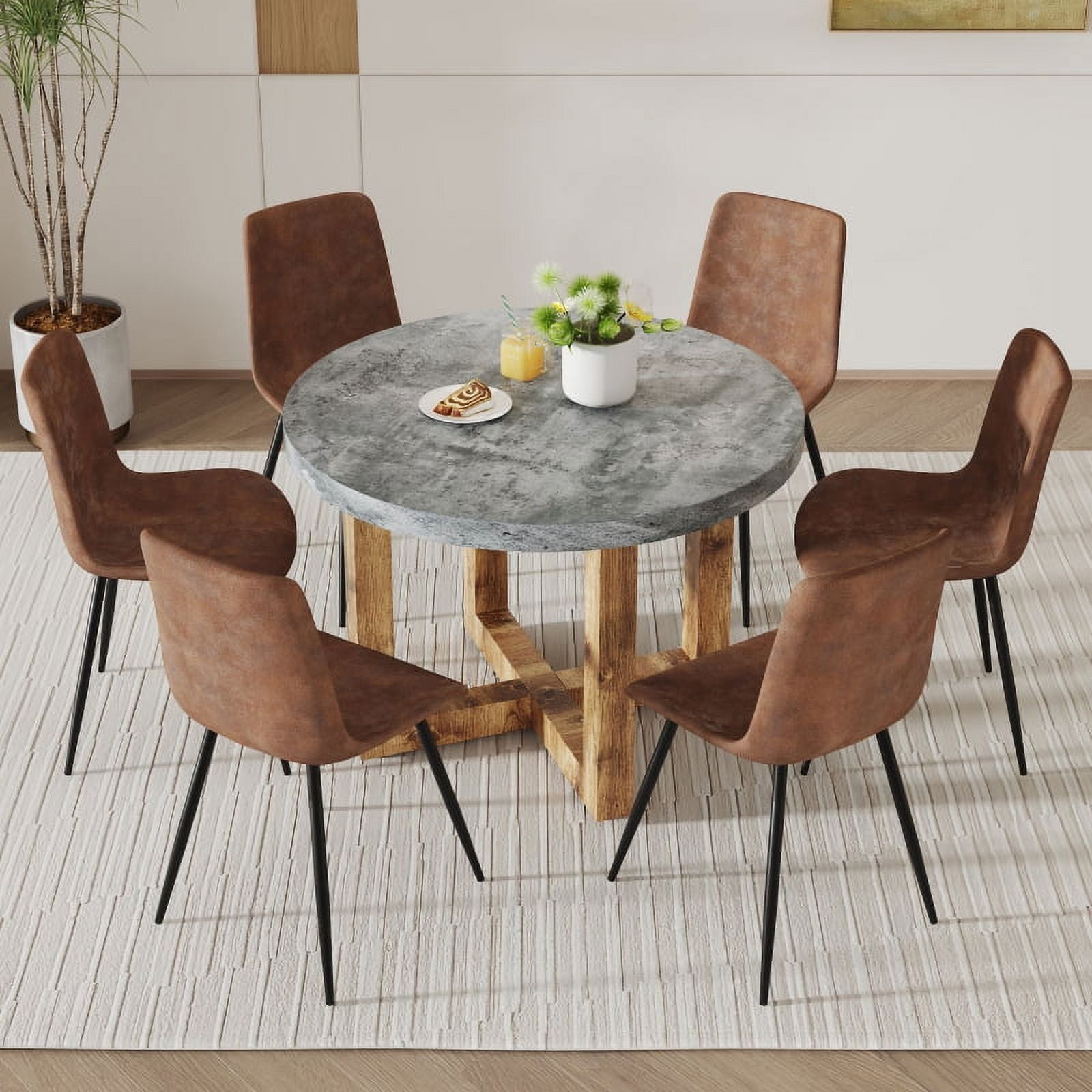 A modern and practical circular dining table. Made of MDF tabletop and ...
