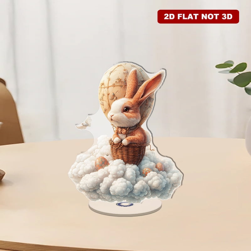 A rotating acrylic display featuring a whimsical red rabbit on an ...
