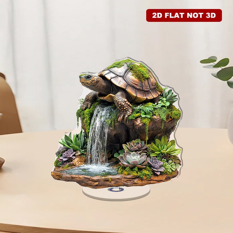 A rotating acrylic display showcasing a moss-covered turtle on a hill ...