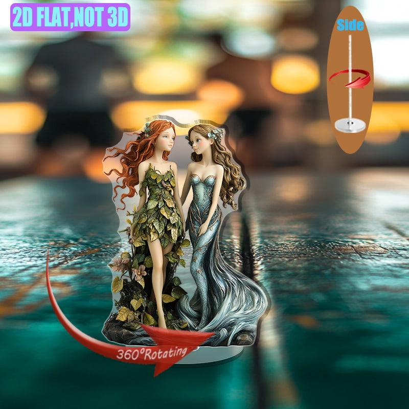 A rotating acrylic ornament featuring a Forest Nymph and River Sprite ...