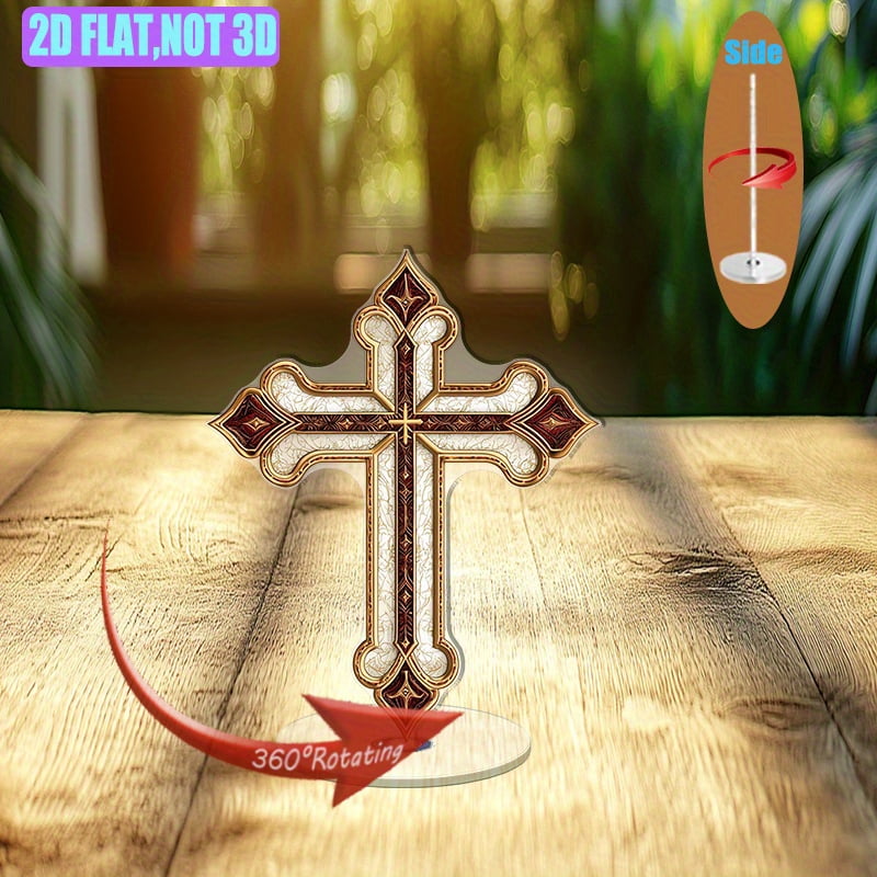 A rotating acrylic ornament featuring a majestic Christian cross with ...