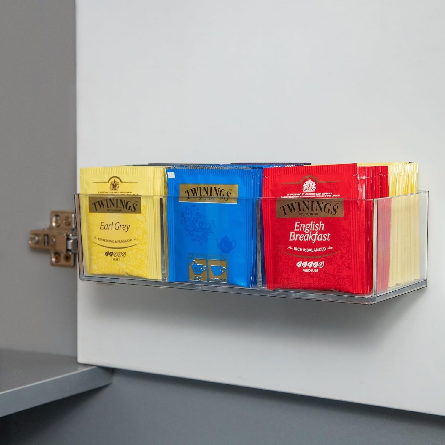 The tea bag organizer can hold up to 60 tea bags, with 3 compartments ...