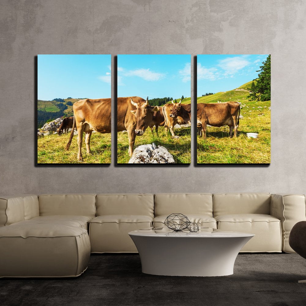 wall26 - 3 Piece Canvas Wall Art - Cows Grazing in a Typical Alpine ...