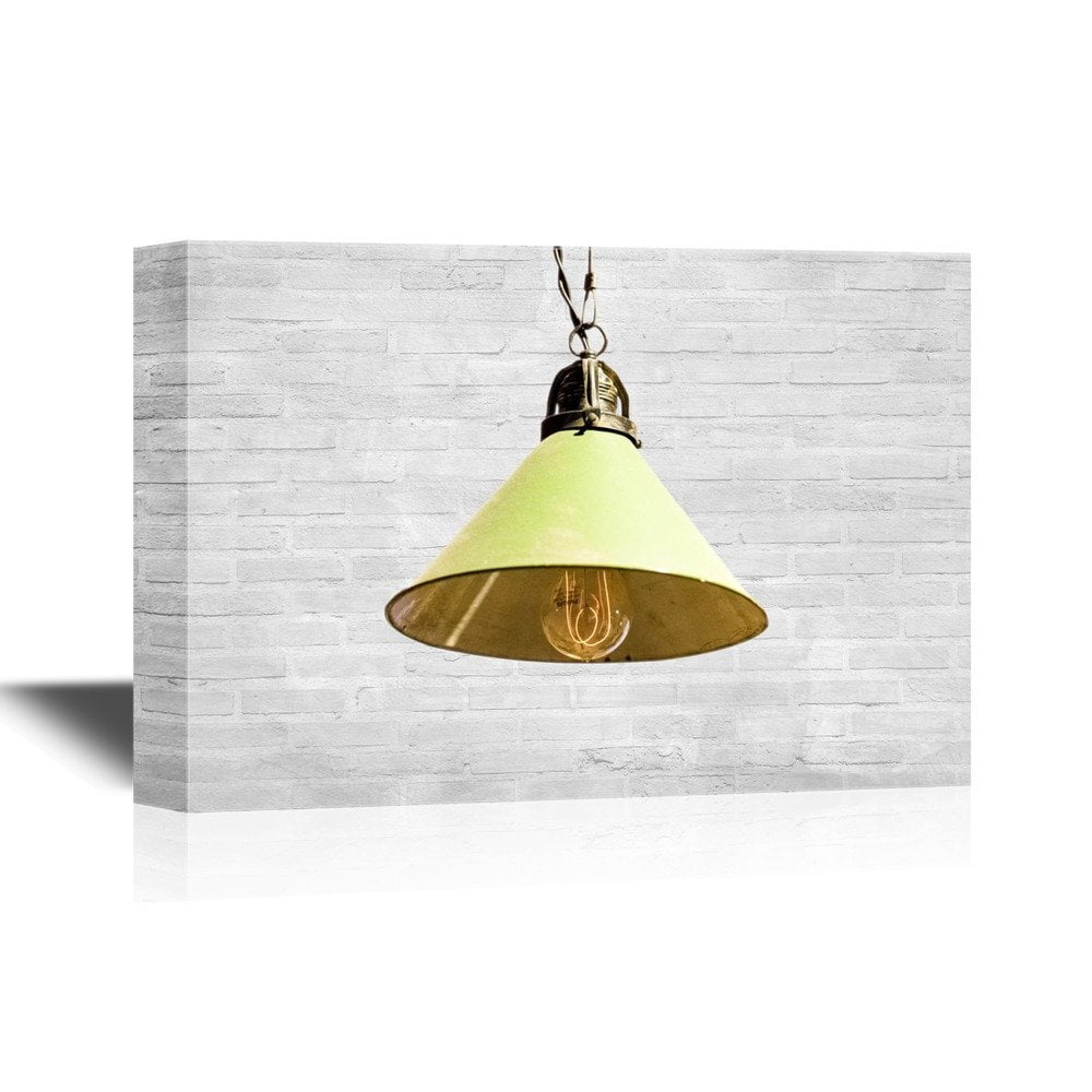 wall26 - Canvas Wall Art - Yellow Light Bulb Against White Brick ...